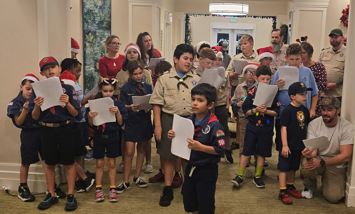 Cub Scouts spread holiday cheer with gifts, songs at Sebastian assisted ...