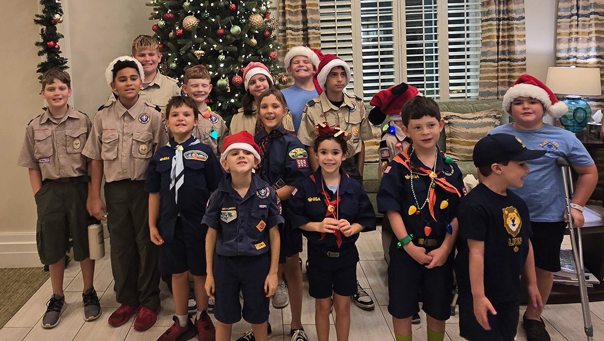Cub Scouts spread holiday cheer with gifts, songs at Sebastian assisted ...